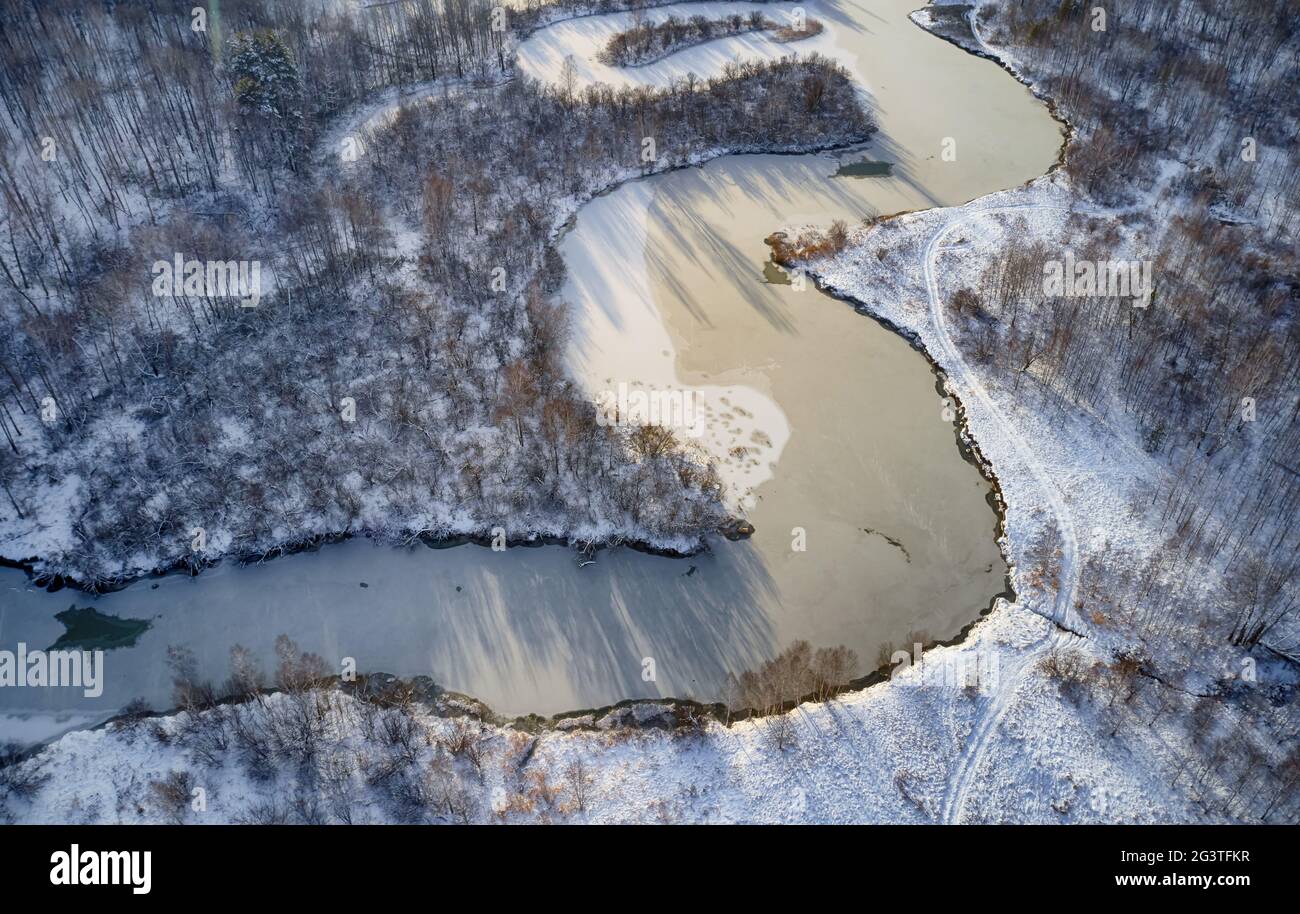 Aerial photo of Koen river under ice and snow. Beautiful winter ...