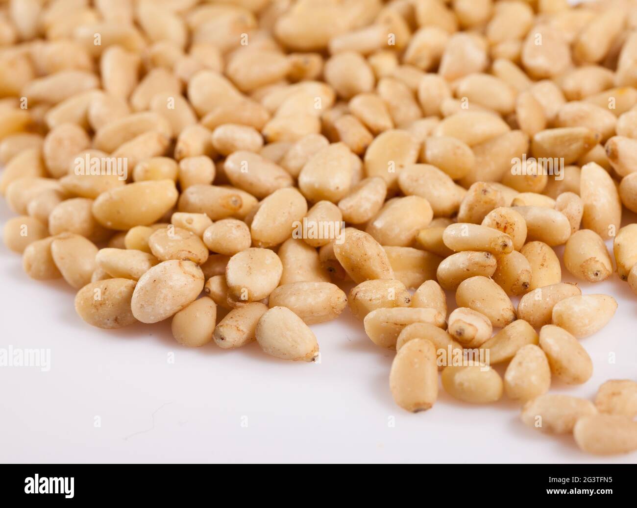 Shelled pine nuts Stock Photo - Alamy