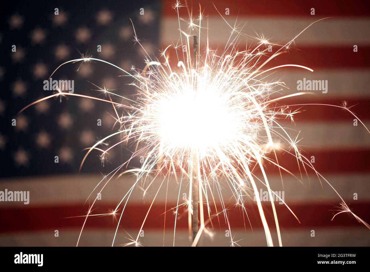 USA American flag lit up by sparklers for 4th of July celebrations ...