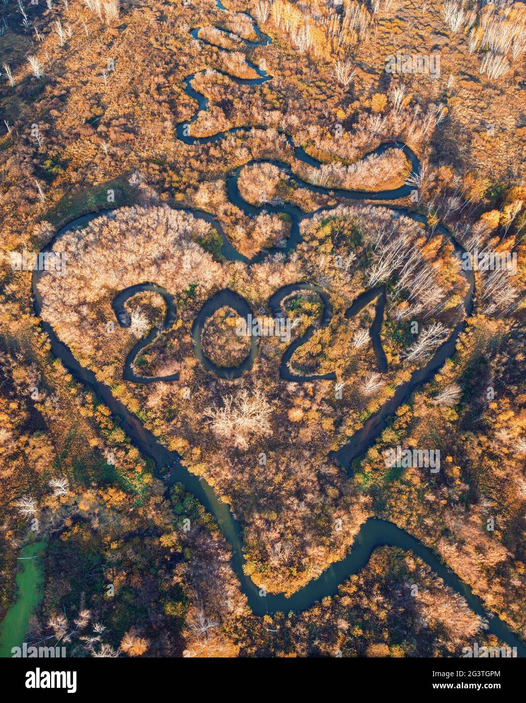 Heart shaped river with 2021 text Stock Photo - Alamy