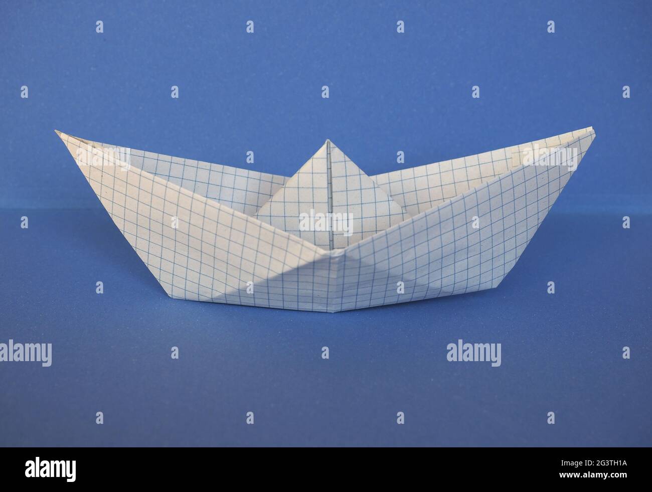 Toy paper boat Stock Photo - Alamy