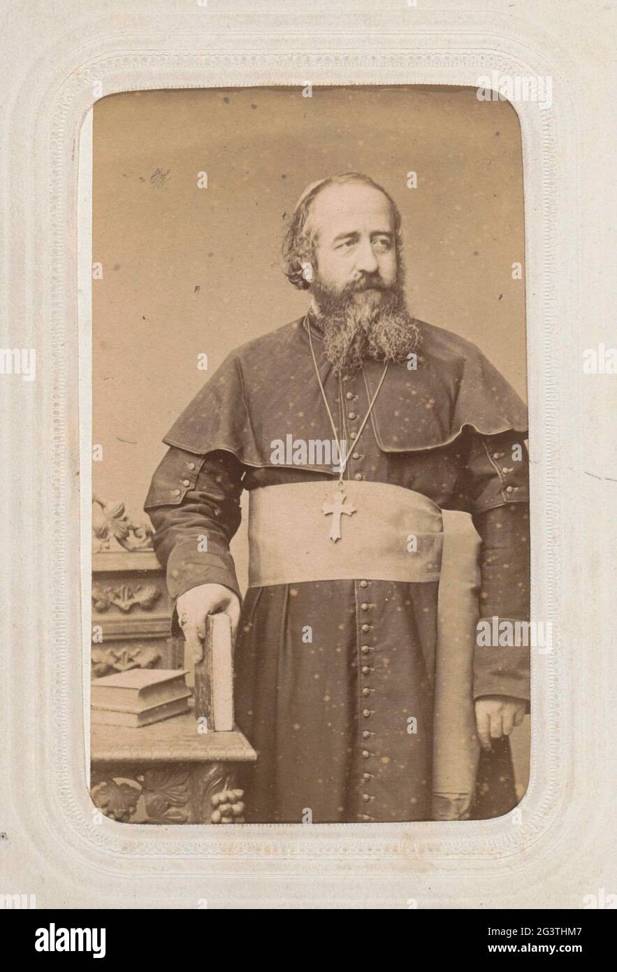 Portrait of a spiritual with a cross around the neck, soutane, pelerine ...