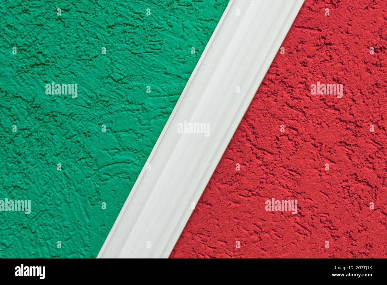 Rough plaster surface painted in a bright color. Variations of harmony ...
