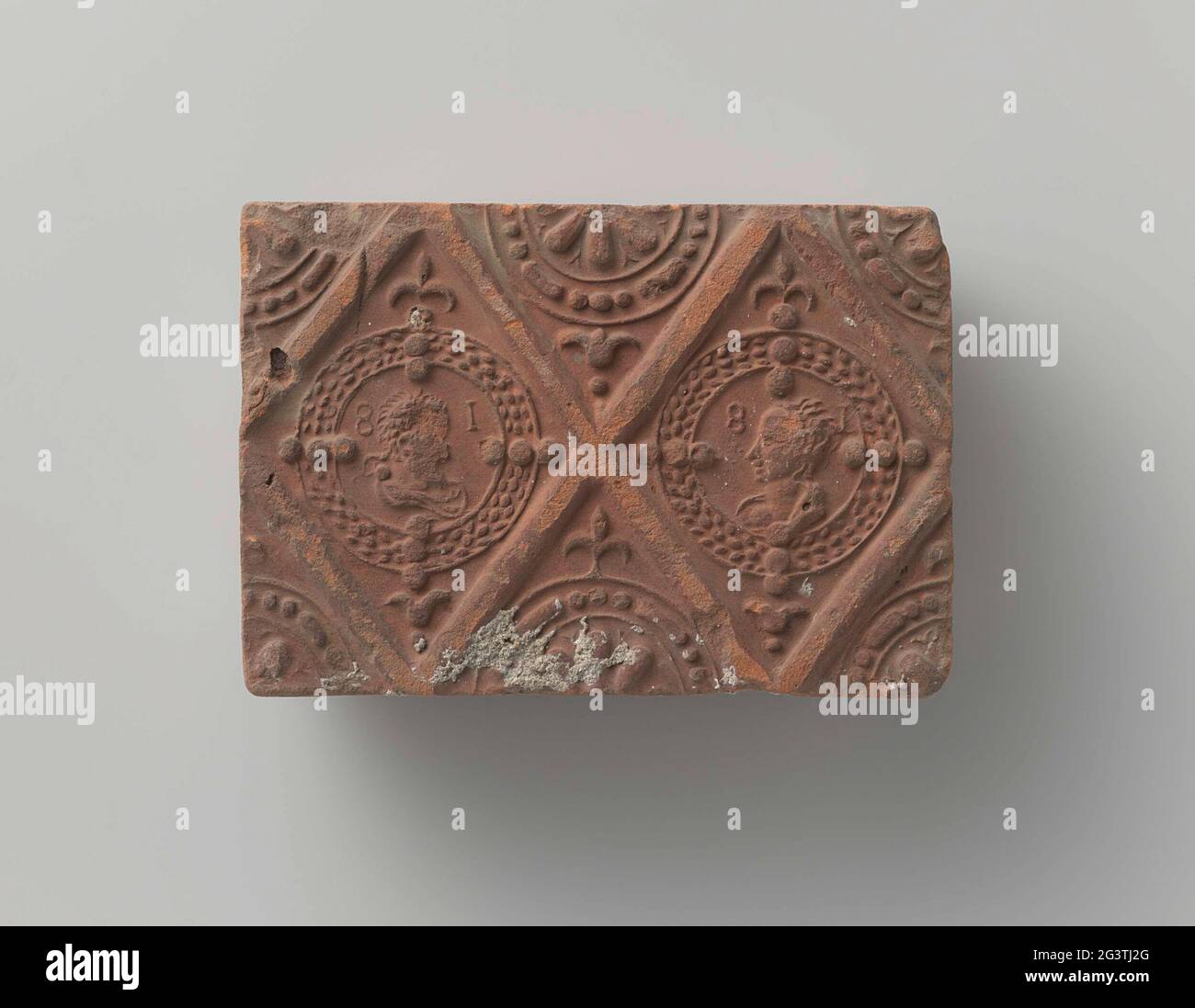 Fireplace of baked earth with diamond-shaped distribution with two ...