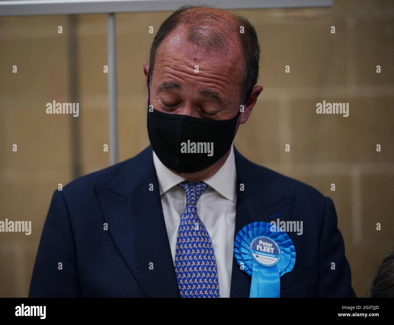 Conservative candidate Peter Fleet, who came second, listens to Sarah ...