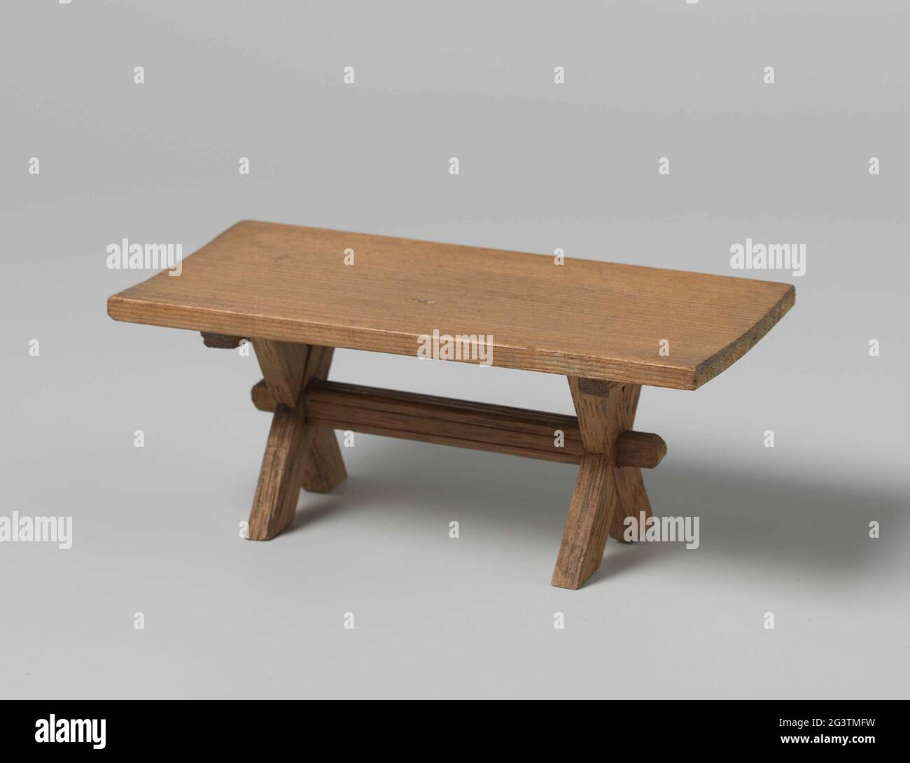 Table, rectangular. Rectangular table with pine leaves on oak paws ...