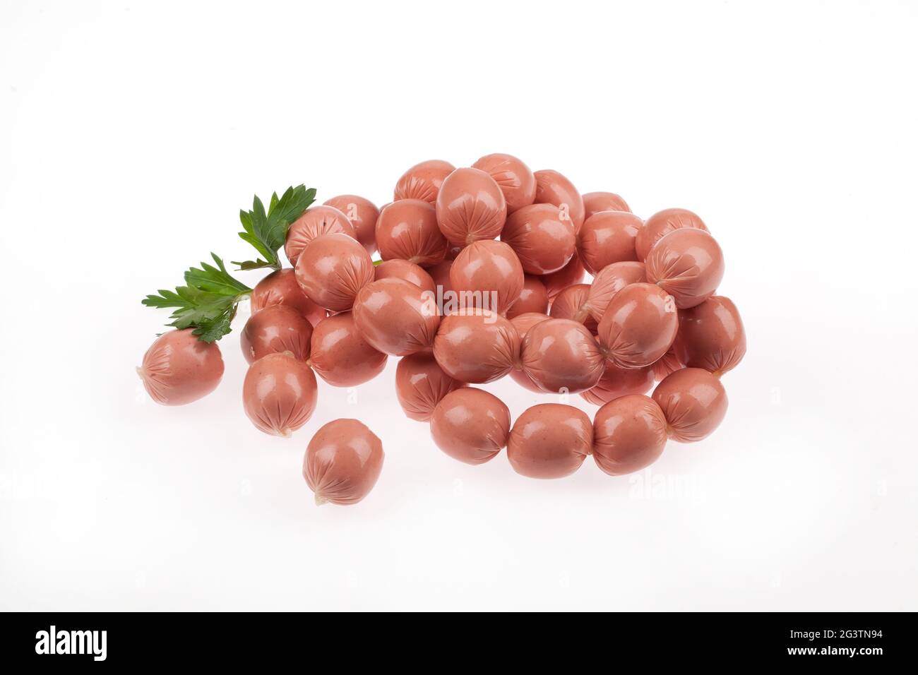 Little Sausages With Greenery Stock Photo - Alamy