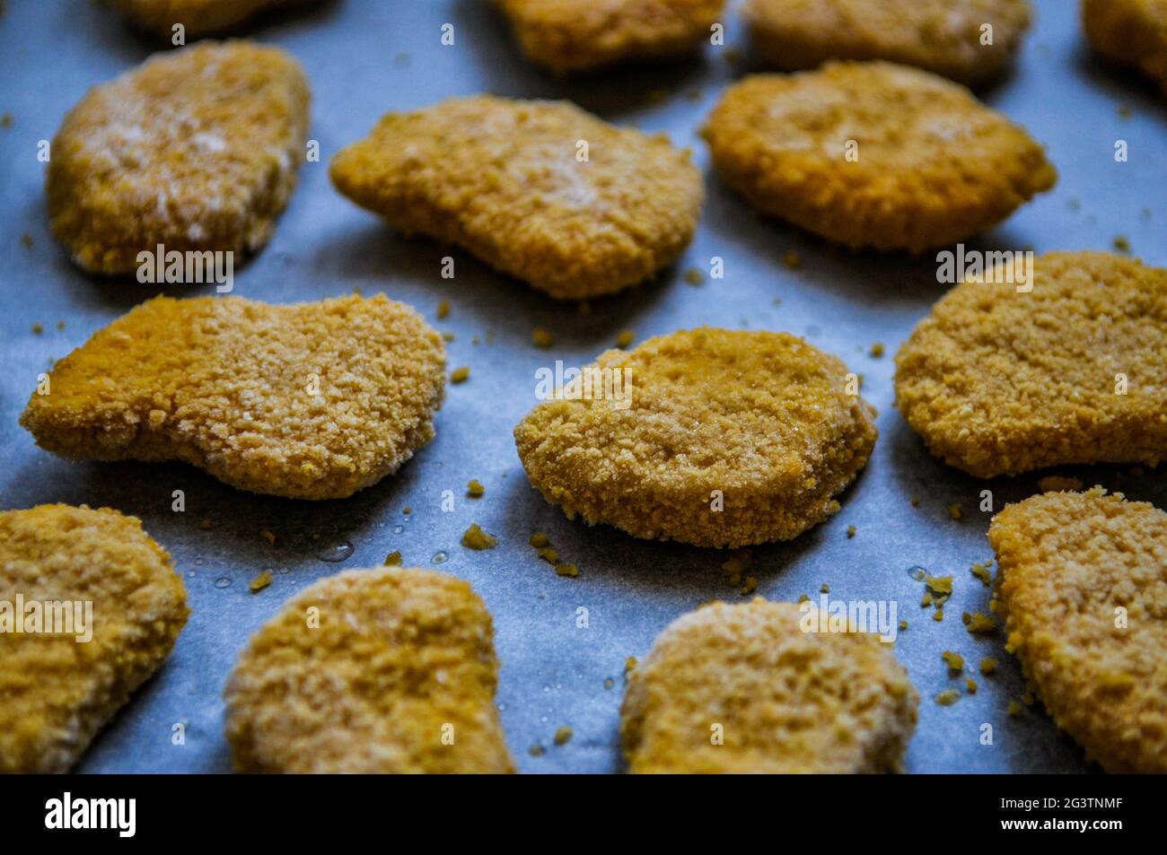 Chicken nuggets on a tray Stock Photo - Alamy