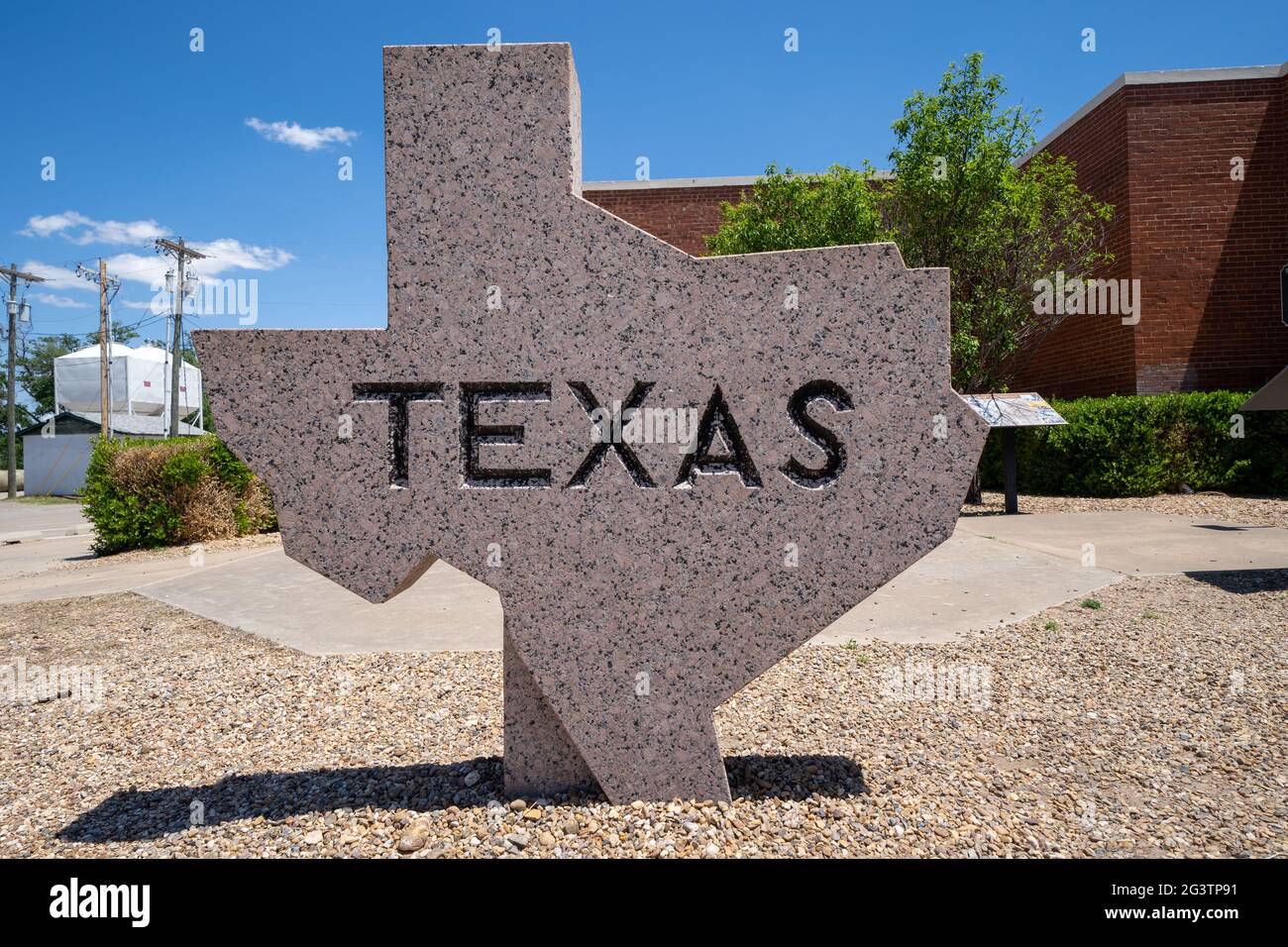 Granite rock monument shaped like the state of Texas Stock Photo - Alamy