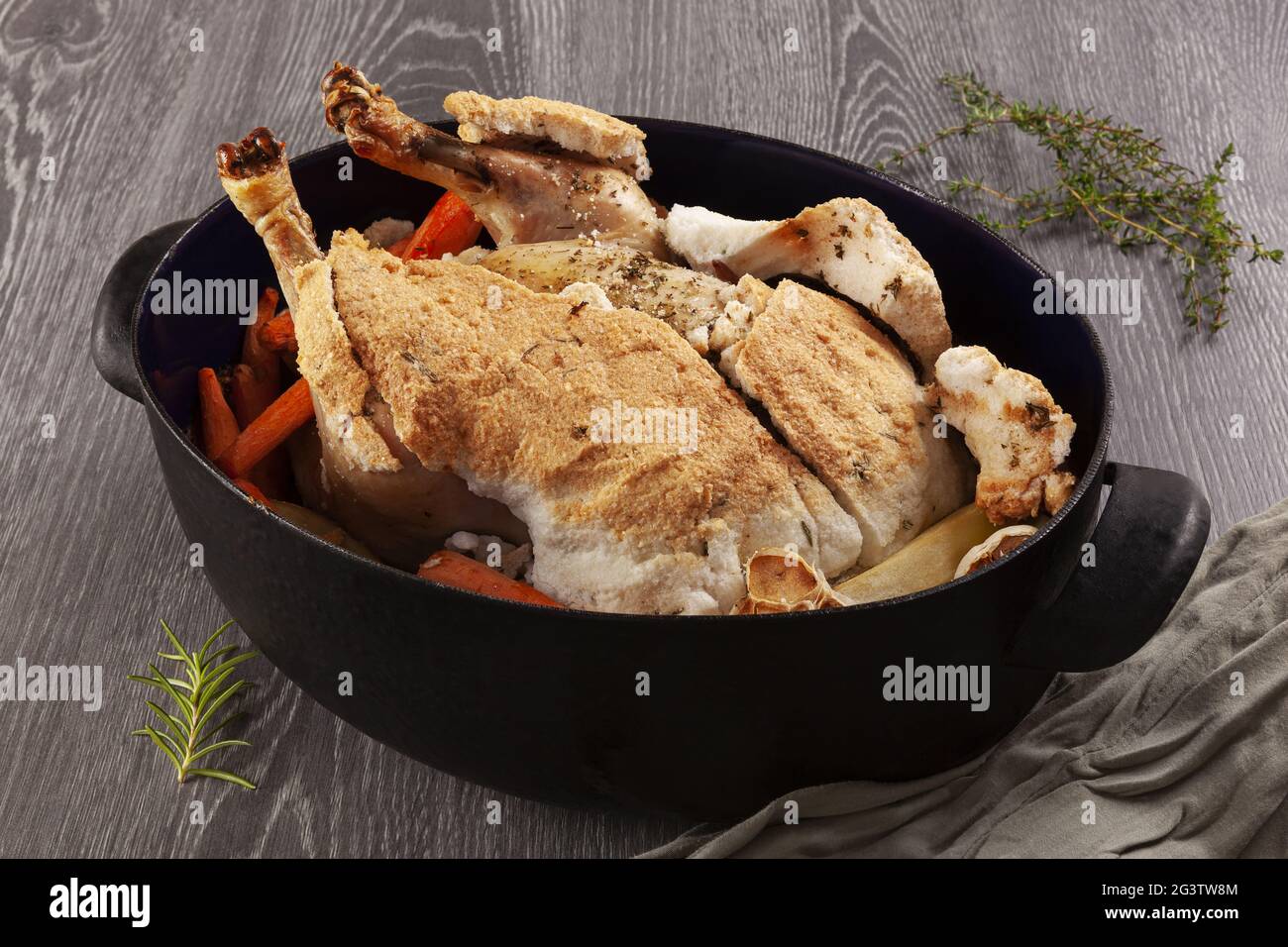 Salt crusted chicken with vegetable Stock Photo - Alamy