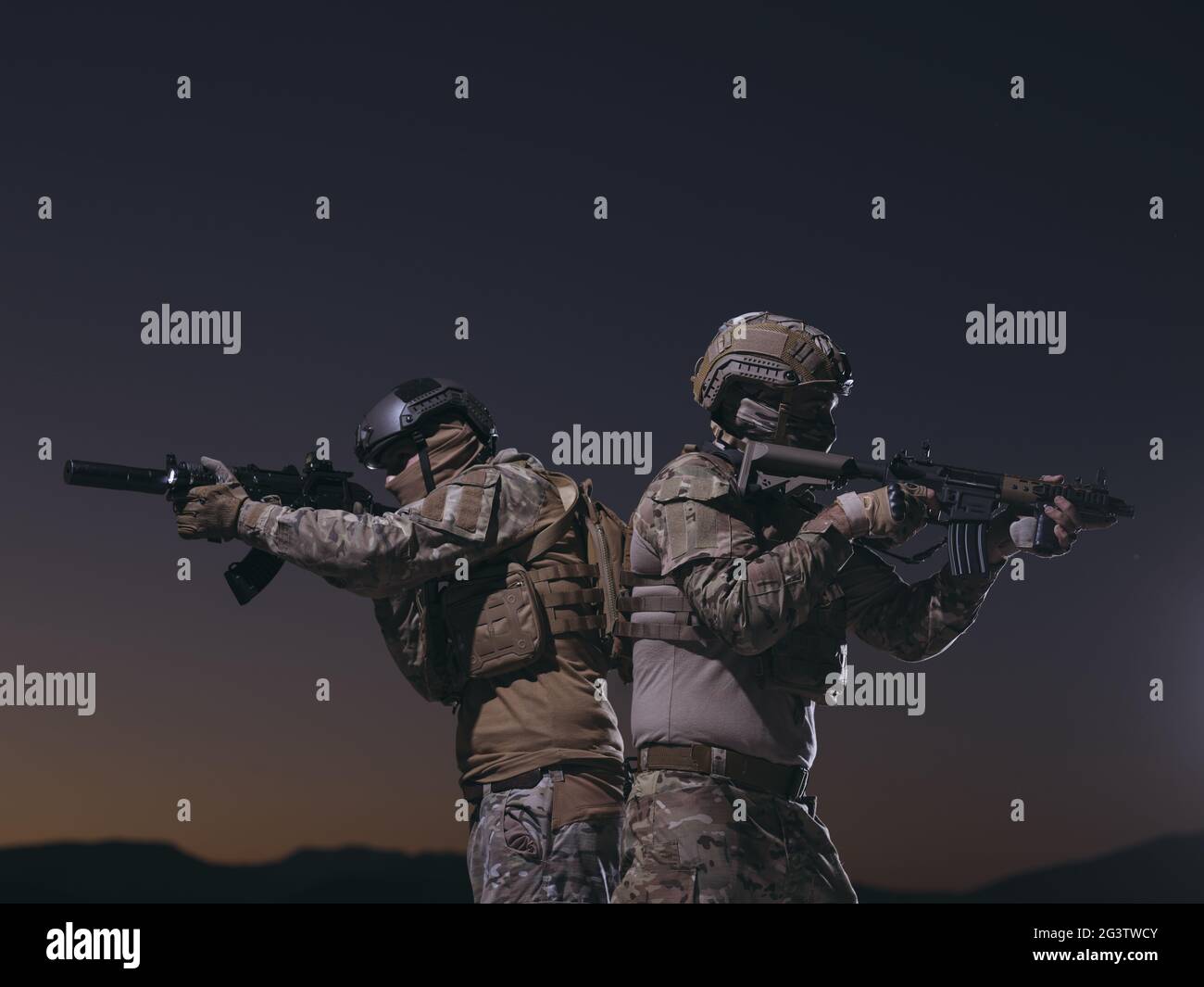 Soldiers squad in night mission Stock Photo - Alamy