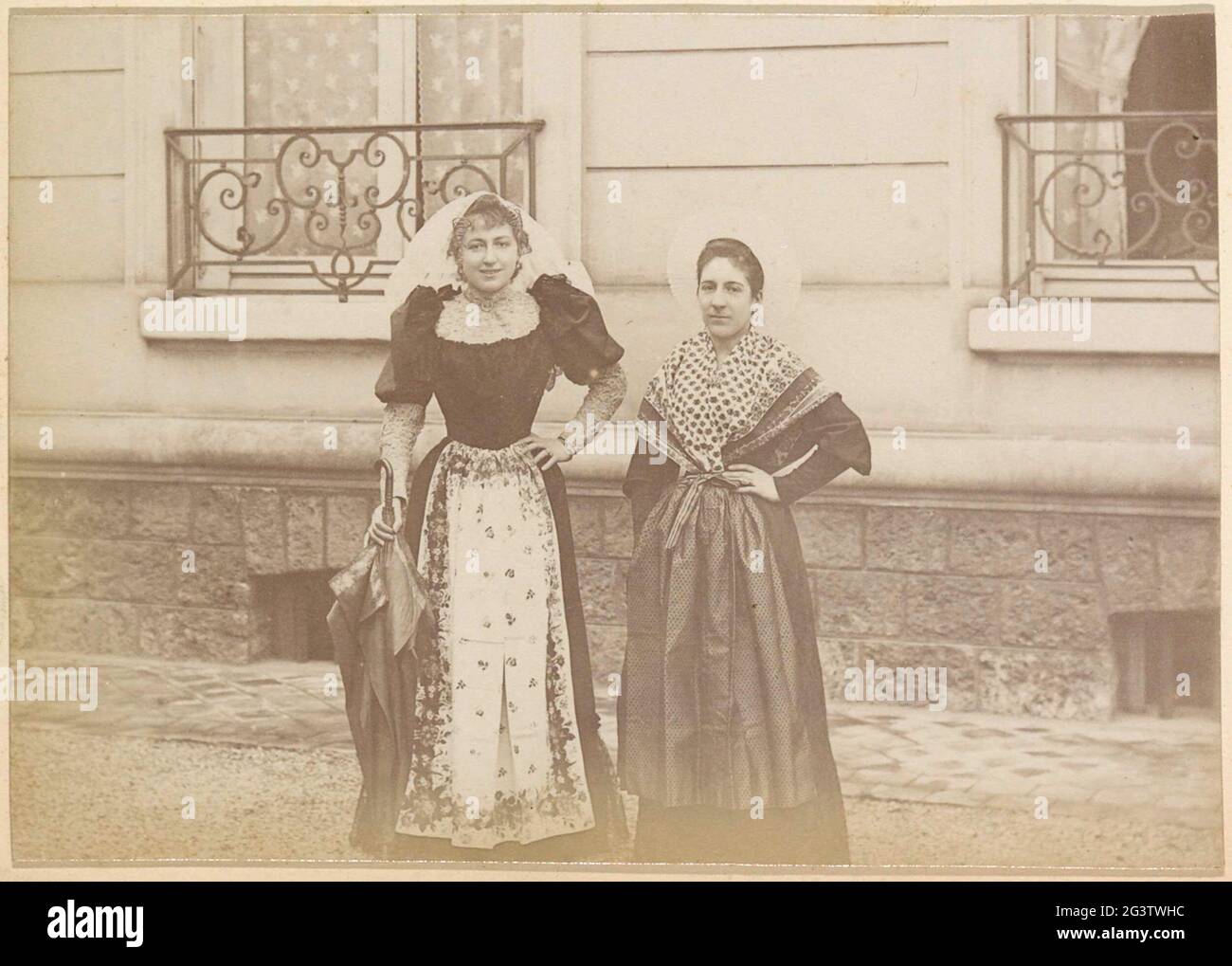 Portrait of two French women in traditional attire with shawl and ...