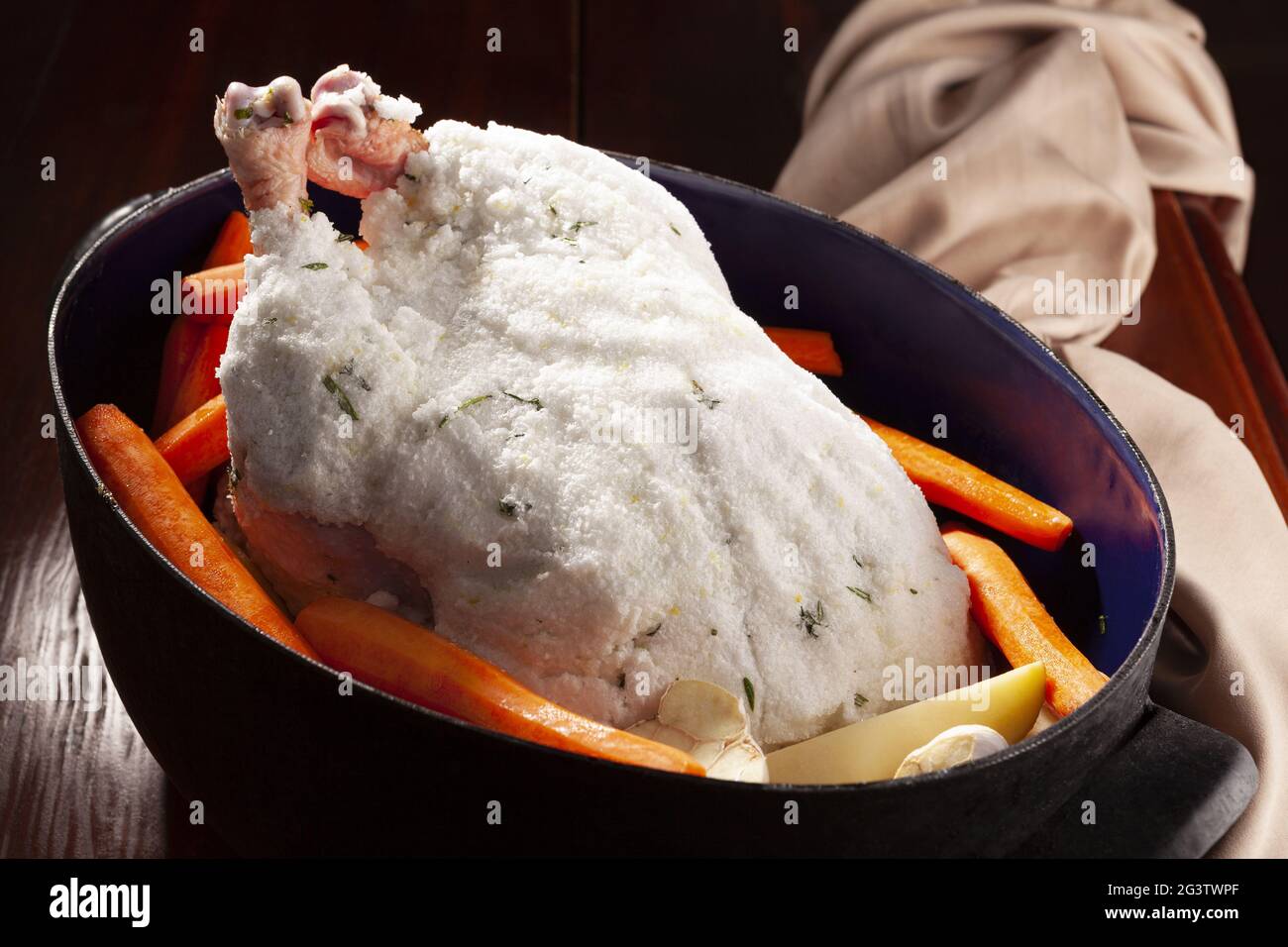 Salt crusted chicken with vegetable Stock Photo - Alamy