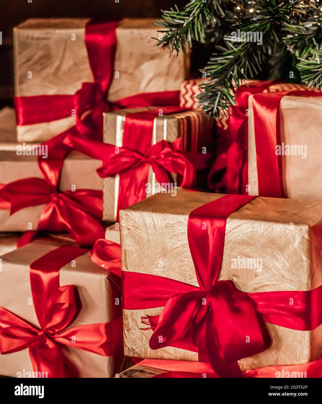 Gift boxes and traditional Christmas tree, wrapped presents and decor ...