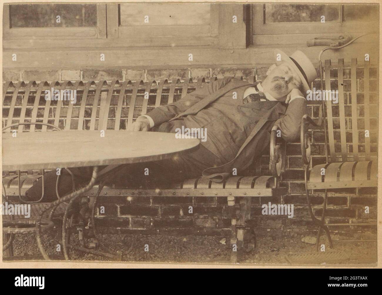Portrait of a French man sleeping on a sofa. Part of photo album from a ...
