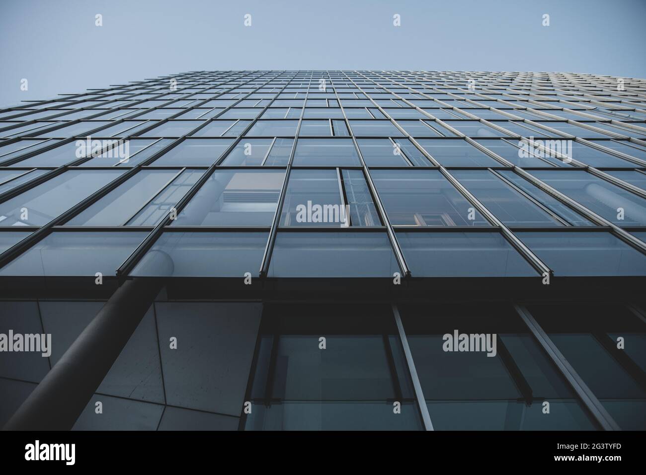 Low angle shot of the glass exterior of a modern skyscraper Stock Photo ...