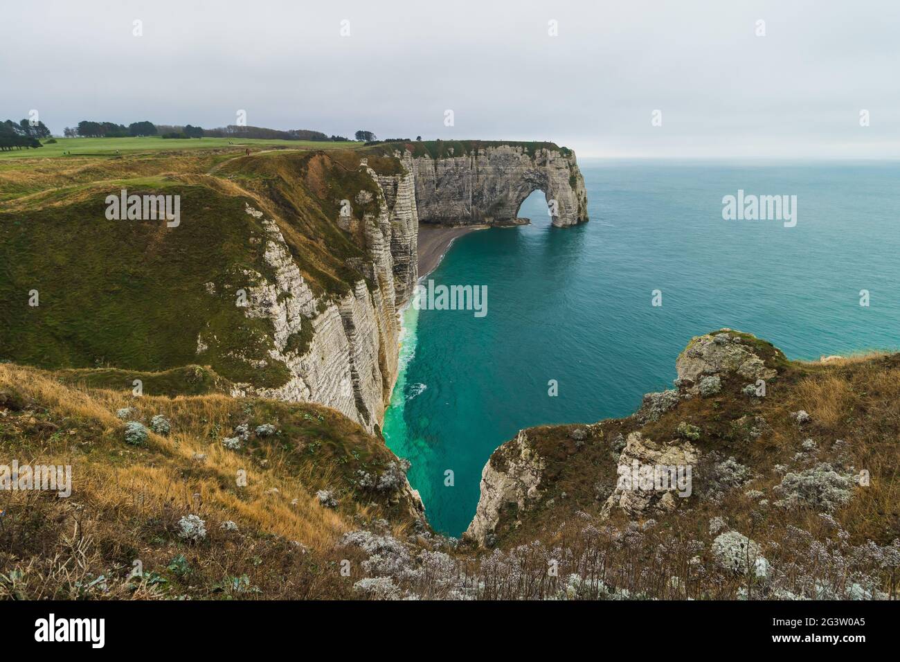 Famous Etretat Aval cliff and natural arch landmark by the ocean in ...