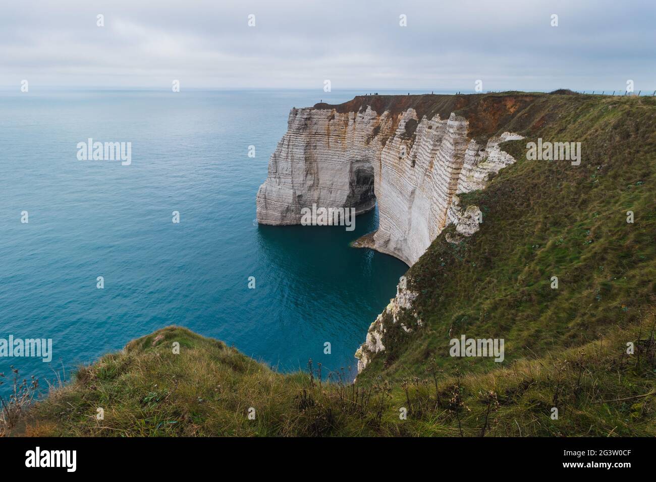 Famous Etretat Aval cliff and natural arch landmark by the ocean in ...