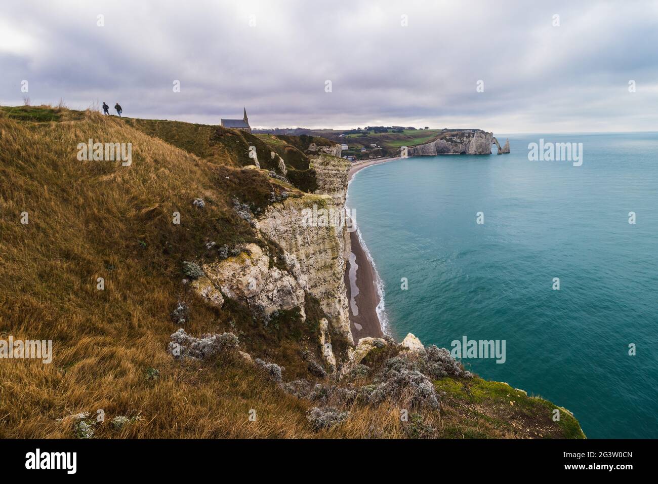 Famous Etretat Aval cliff and natural arch landmark by the ocean in ...