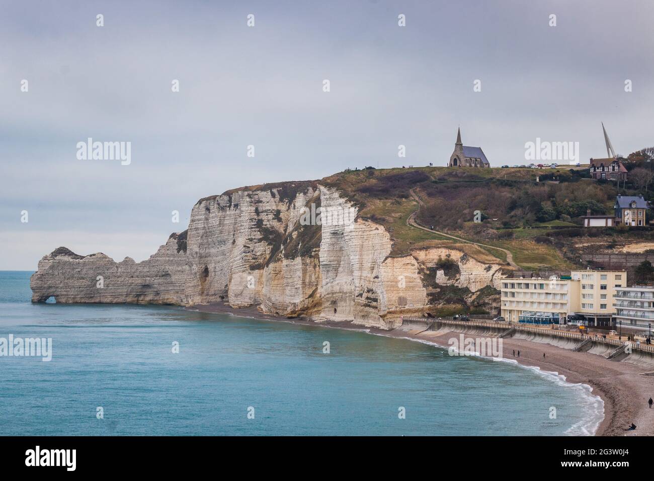 Famous Etretat Aval cliff and natural arch landmark by the ocean in ...