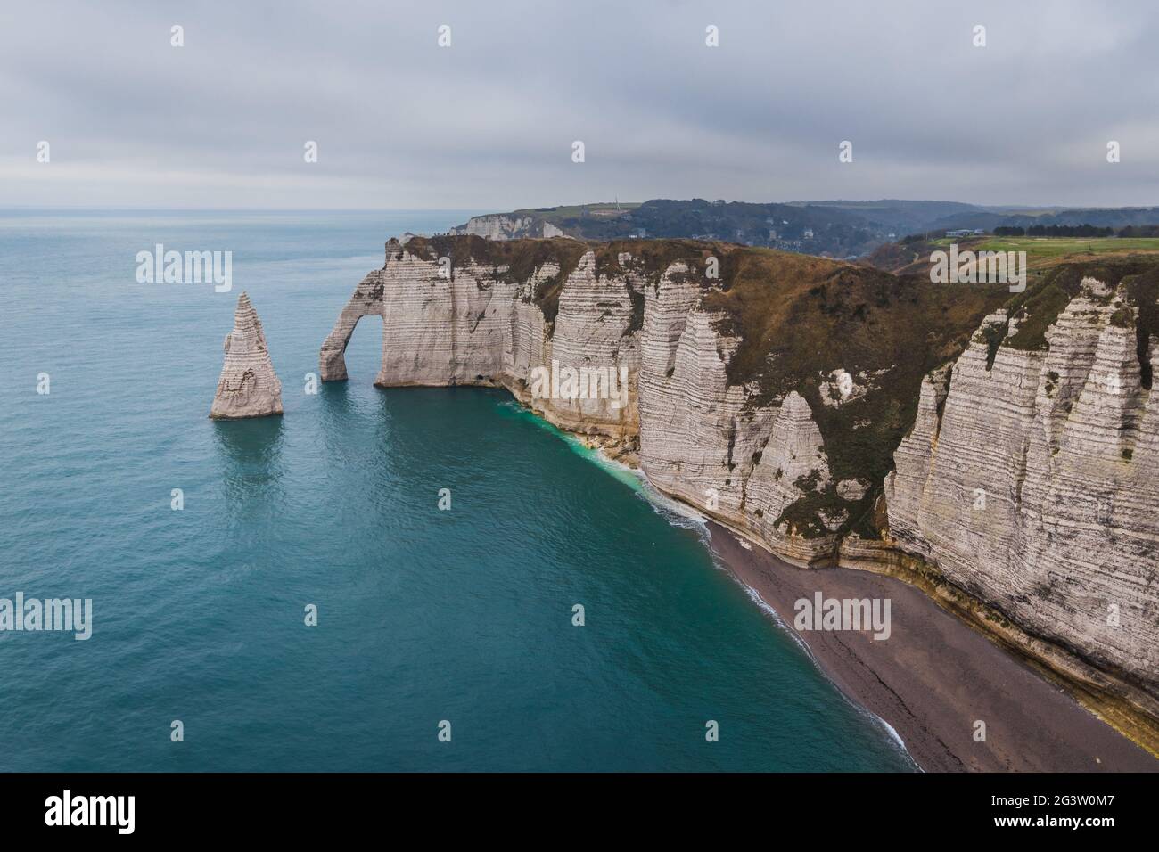 Famous Etretat Aval cliff and natural arch landmark by the ocean in ...