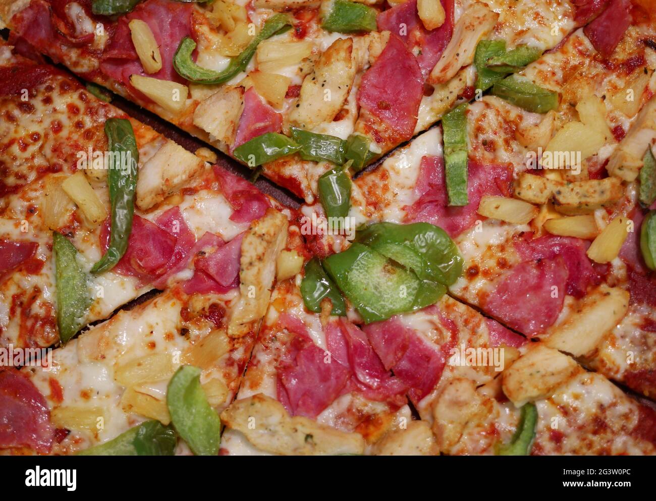 Delicious fresh pepperoni and pepper pizza Stock Photo - Alamy