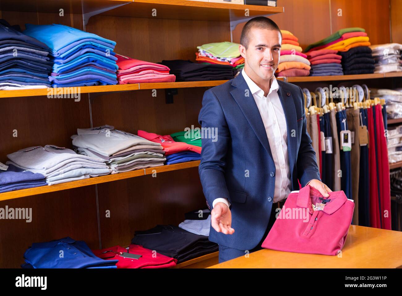 Male shop assistant clothes shop hi-res stock photography and images ...