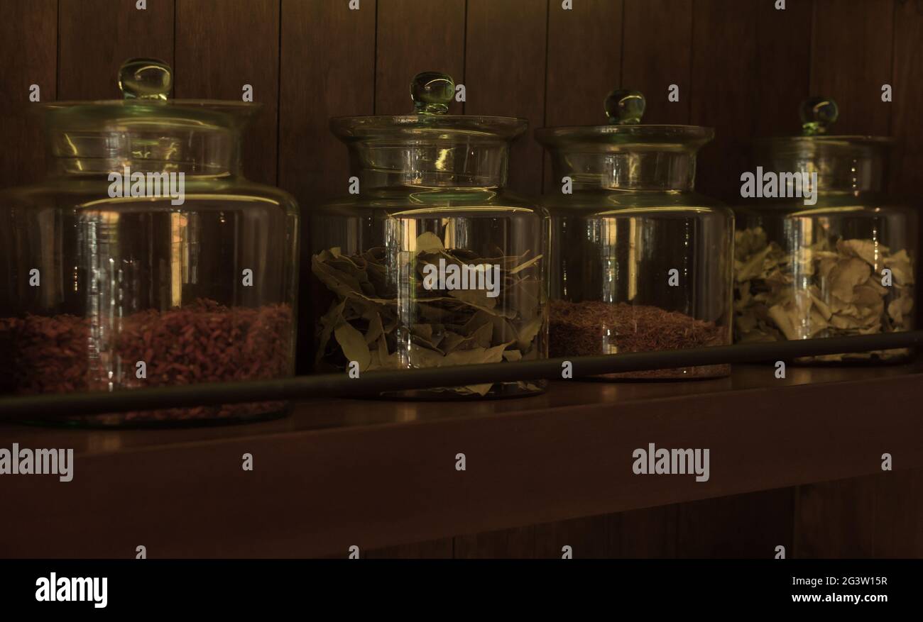 Arrangement of dry food products on dark wooden shelves Stock Photo - Alamy