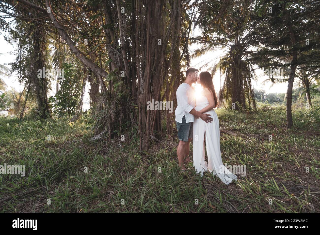 Romantic couple in the garden Stock Photo - Alamy