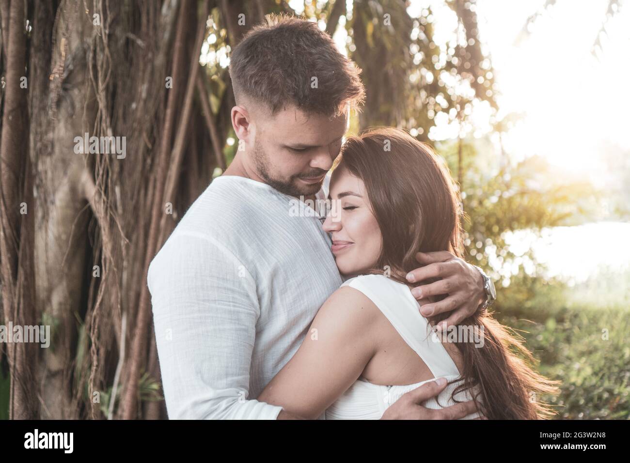 Romantic couple in the garden Stock Photo - Alamy