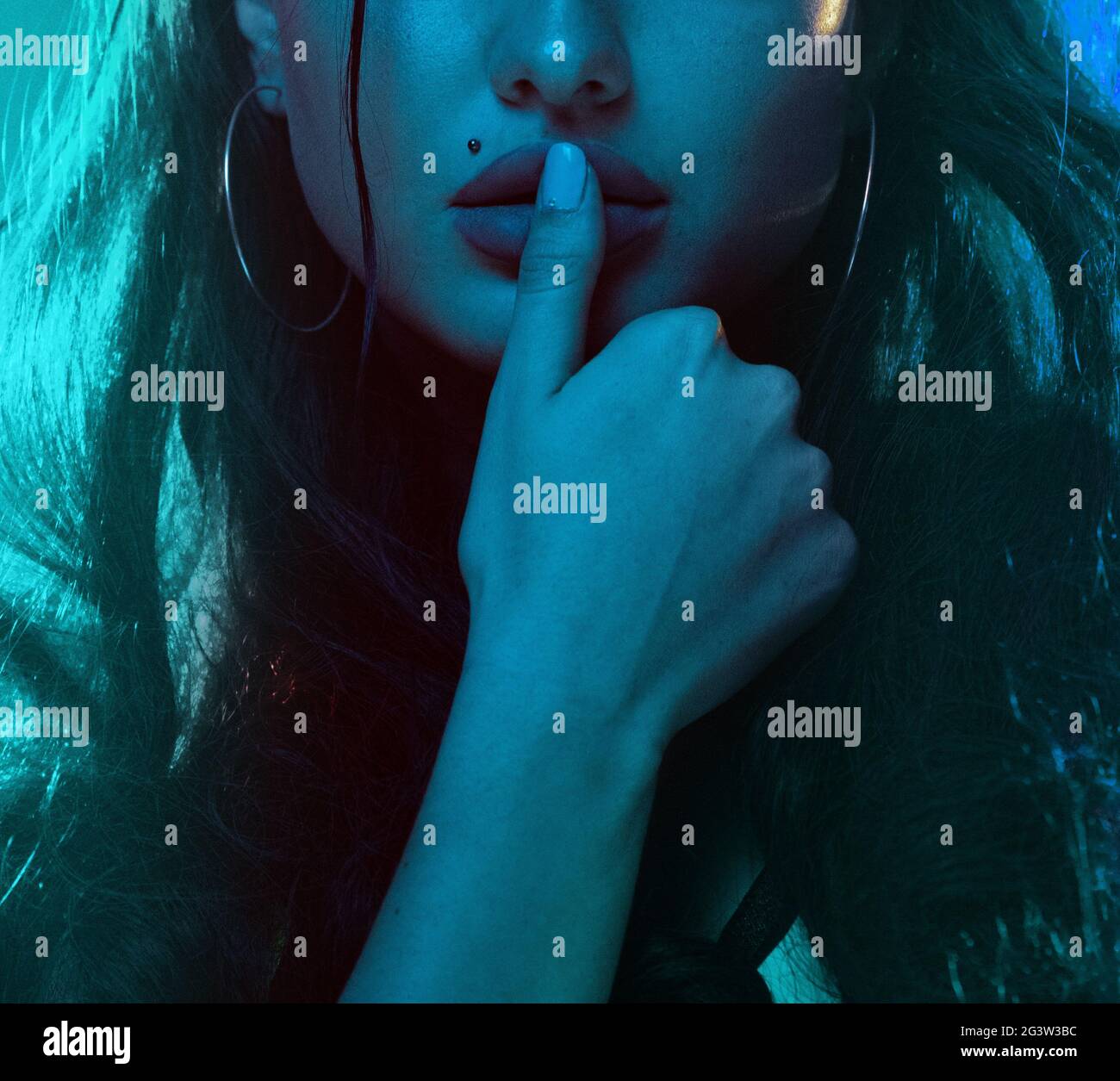 Sensual woman neon light half portrait Stock Photo - Alamy