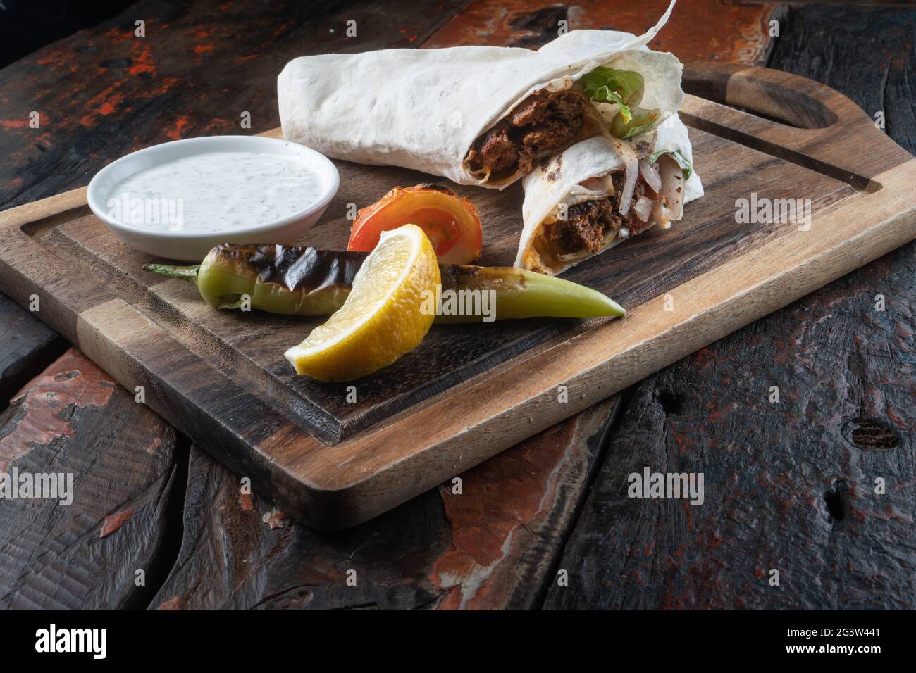Turkish and Arabic traditional Ramadan Adana kebab roll wrap serving ...