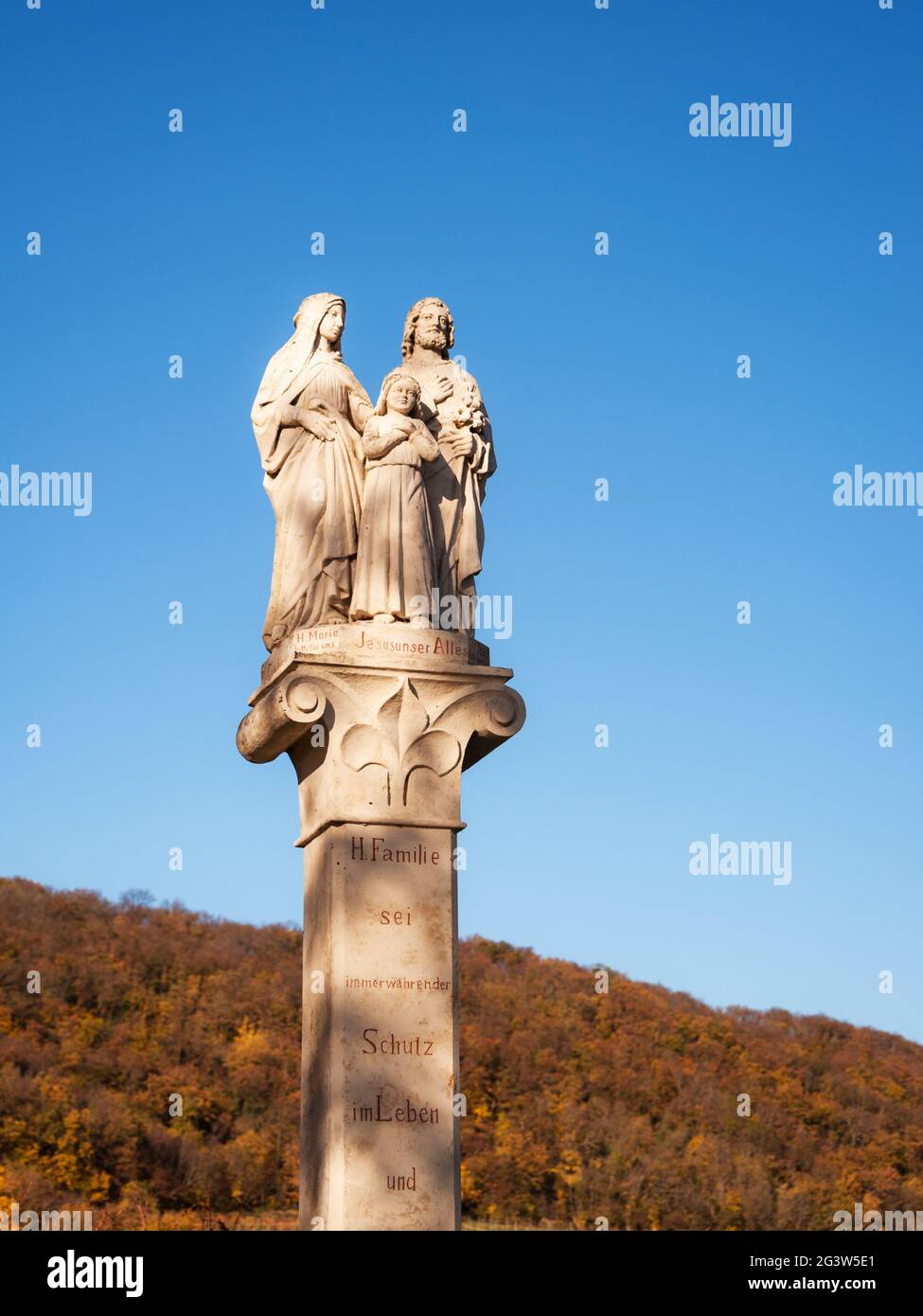 Holy family on a religious column Stock Photo - Alamy