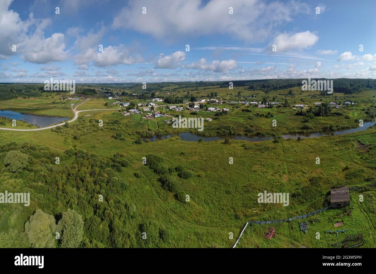 Siberian village on small river Stock Photo - Alamy