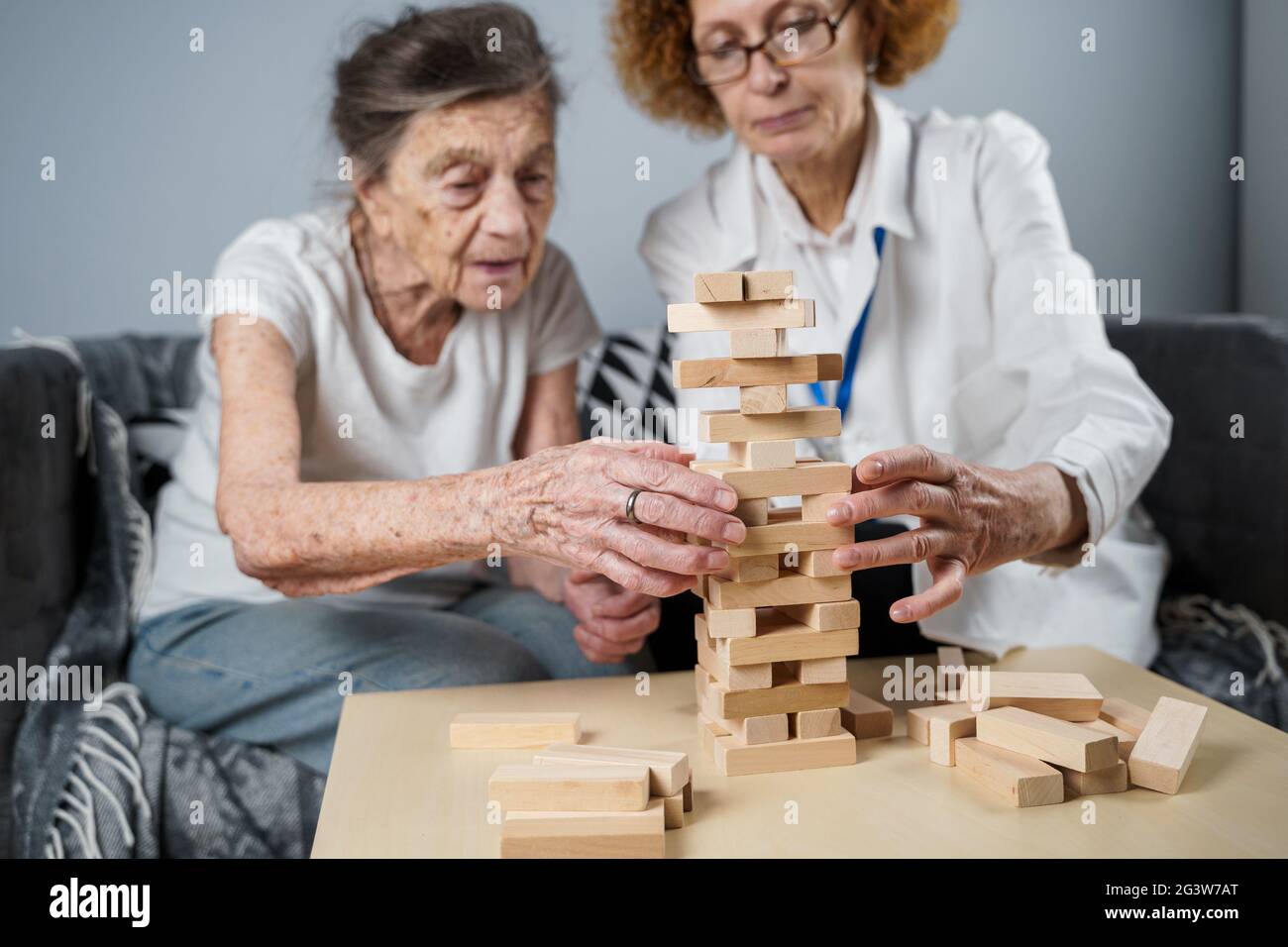 Jenga game. Theme is dementia, aging and games for old people ...