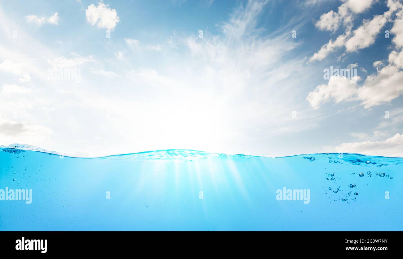 Waterline with sea underwater and blue sunny sky with clouds Stock ...