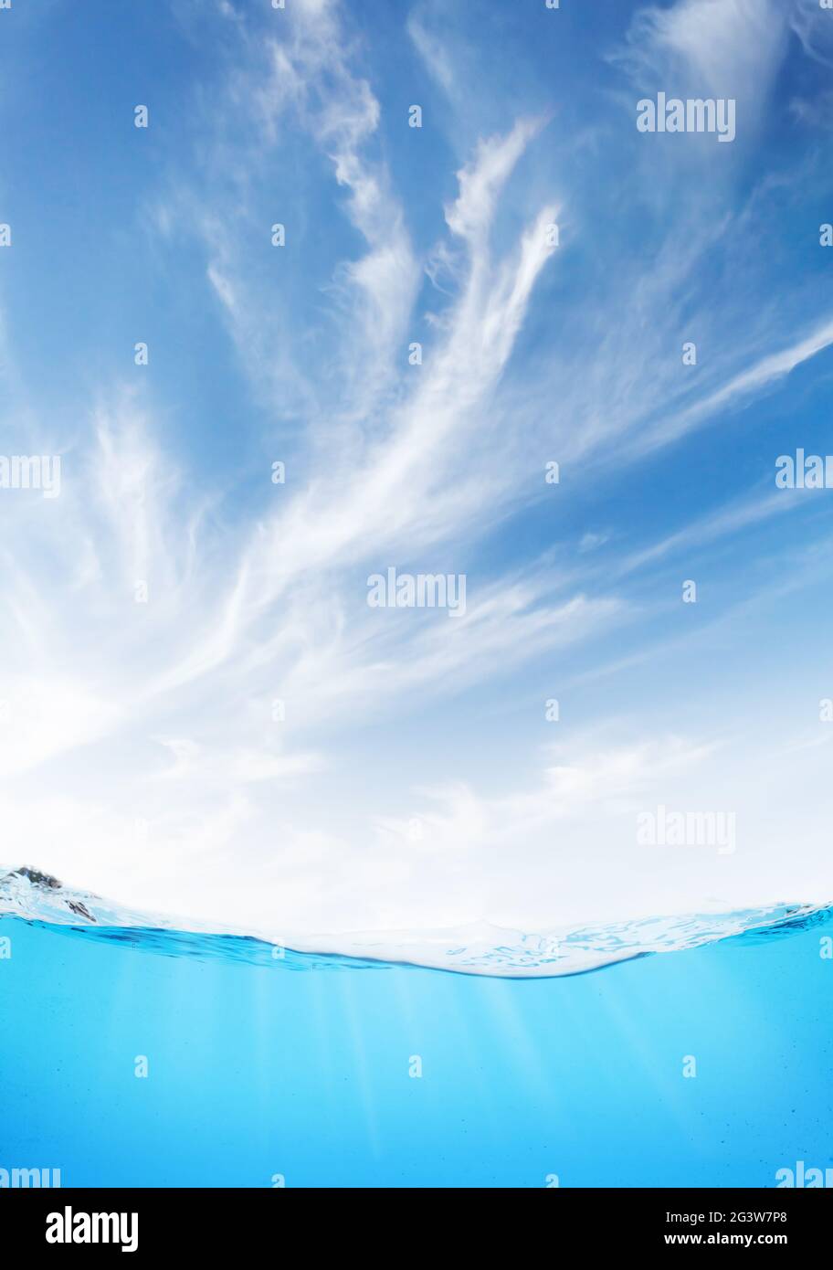 Waterline with sea underwater and blue sunny sky with clouds Stock ...