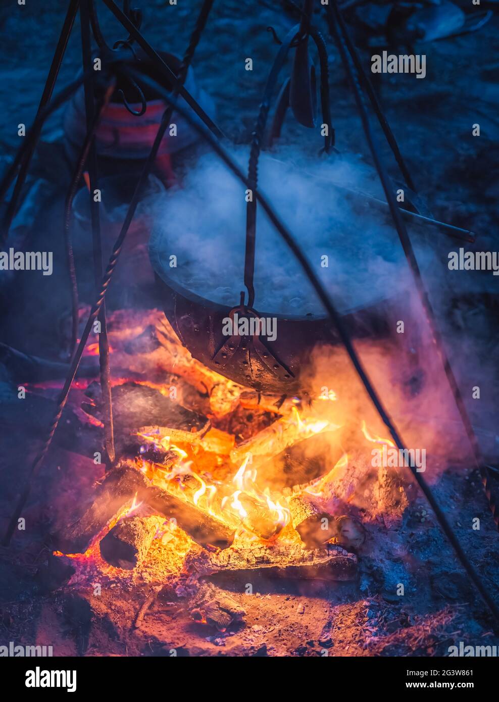 Boiling cauldron with mysterious decoction at Kupala Night Stock Photo ...