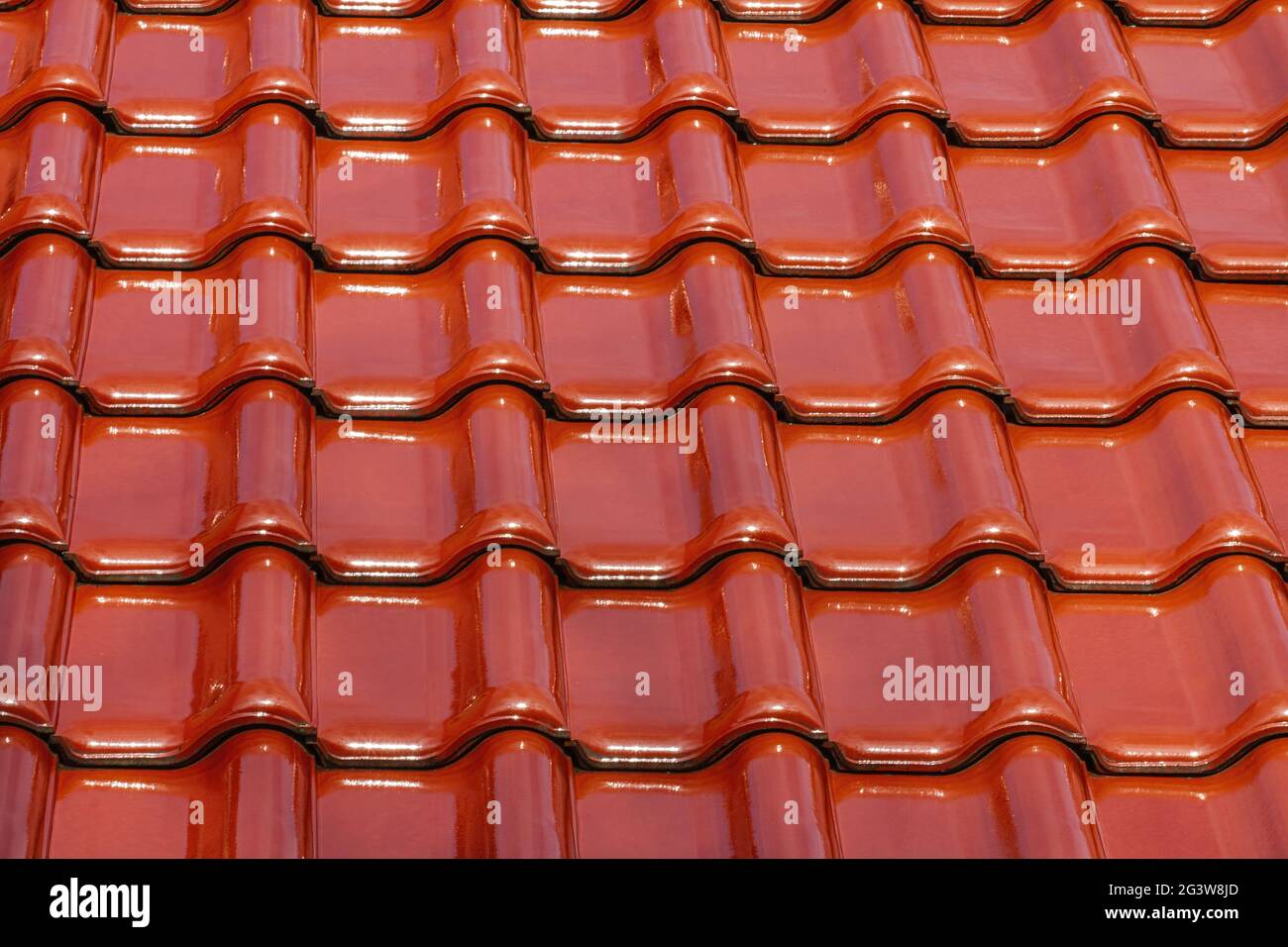 Tiled roof covered with glazed clay tiles Stock Photo - Alamy