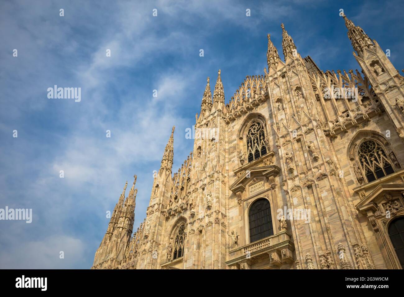 Milan Cathedral (Duomo di Milano) with blue sky and sunset light Stock ...