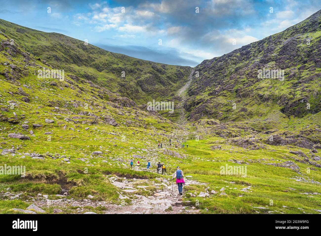 Group of hikers starting to climb Devils Ladder to reach Carrauntoohil ...