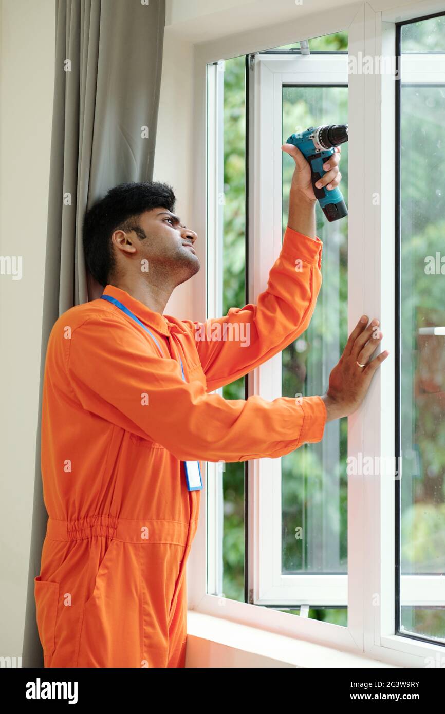 Installing window hi-res stock photography and images - Alamy