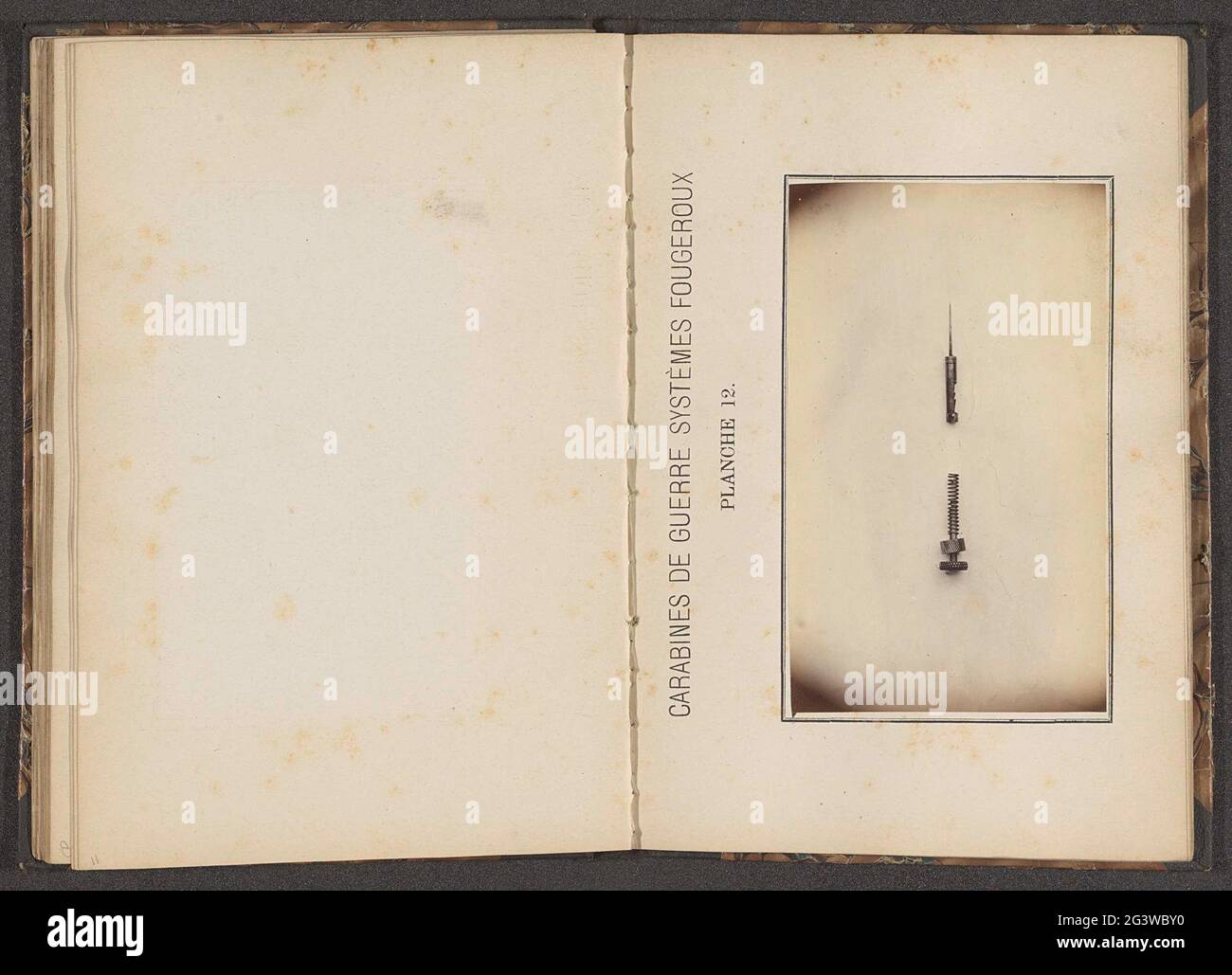 Two parts of the safety catch of a gun Stock Photo - Alamy