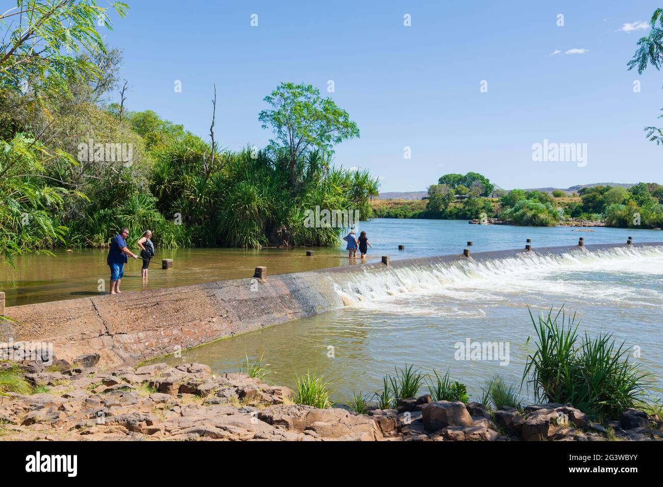 Fisherman and pedestrians at the iconic Ivanhoe Crossing, The Kimberley ...