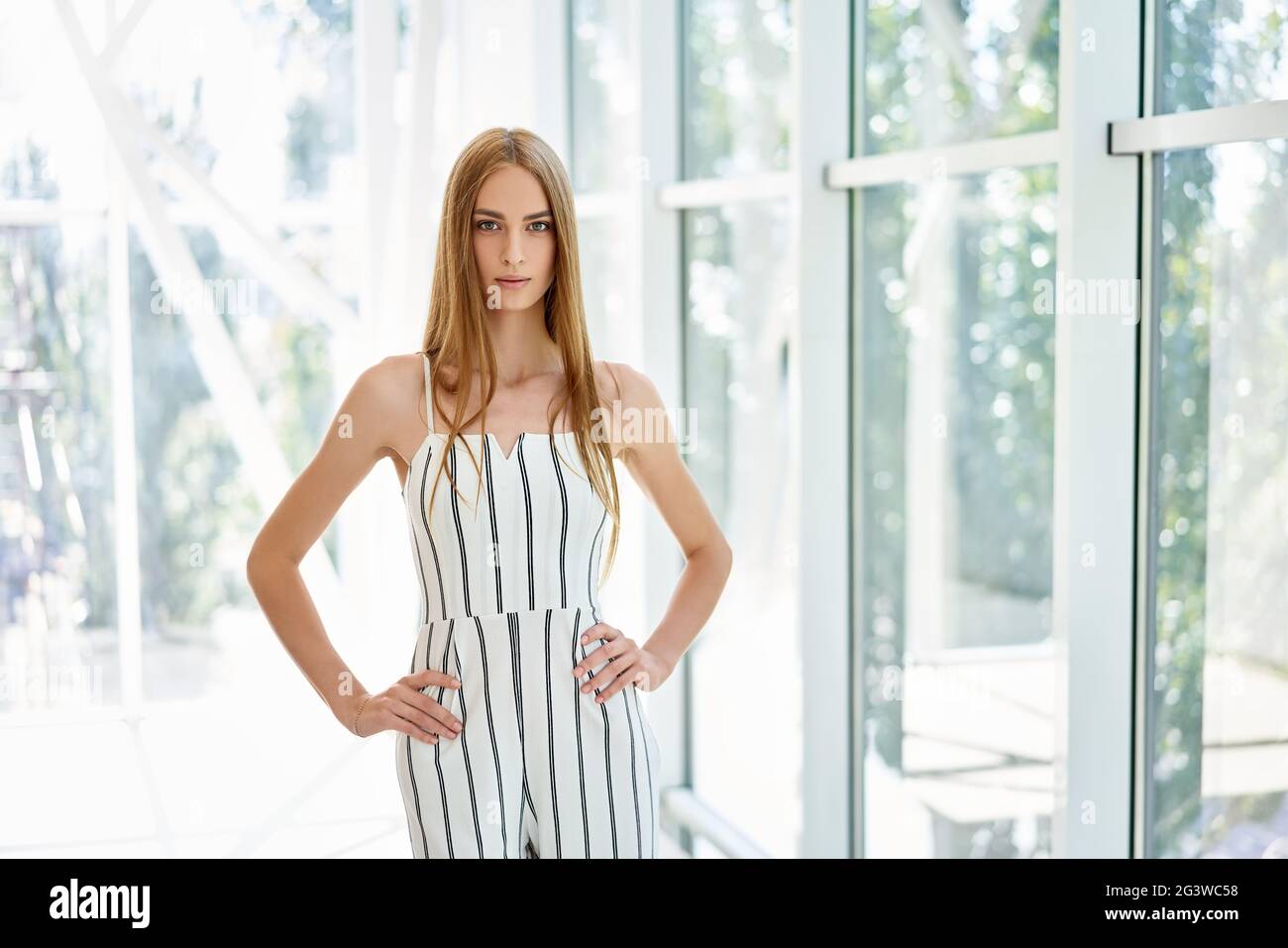 Beautiful young modern female posing hi-res stock photography and ...