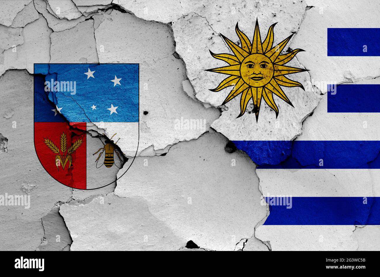 Flags of Colonia Department and Uruguay painted on cracked wall Stock ...