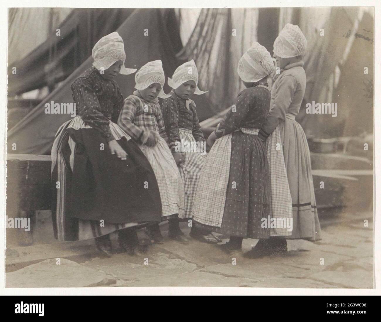 Group portrait of five girls in traditional costume, presumably in ...