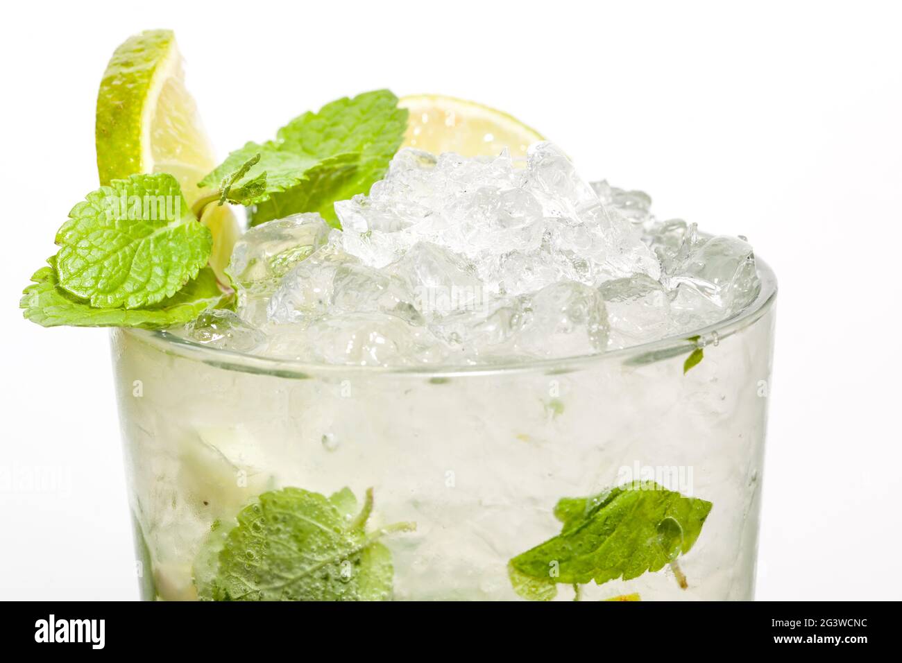 Cocktail - alcoholic mojito: syrup, lime, mint, Cuban rum, ice ...