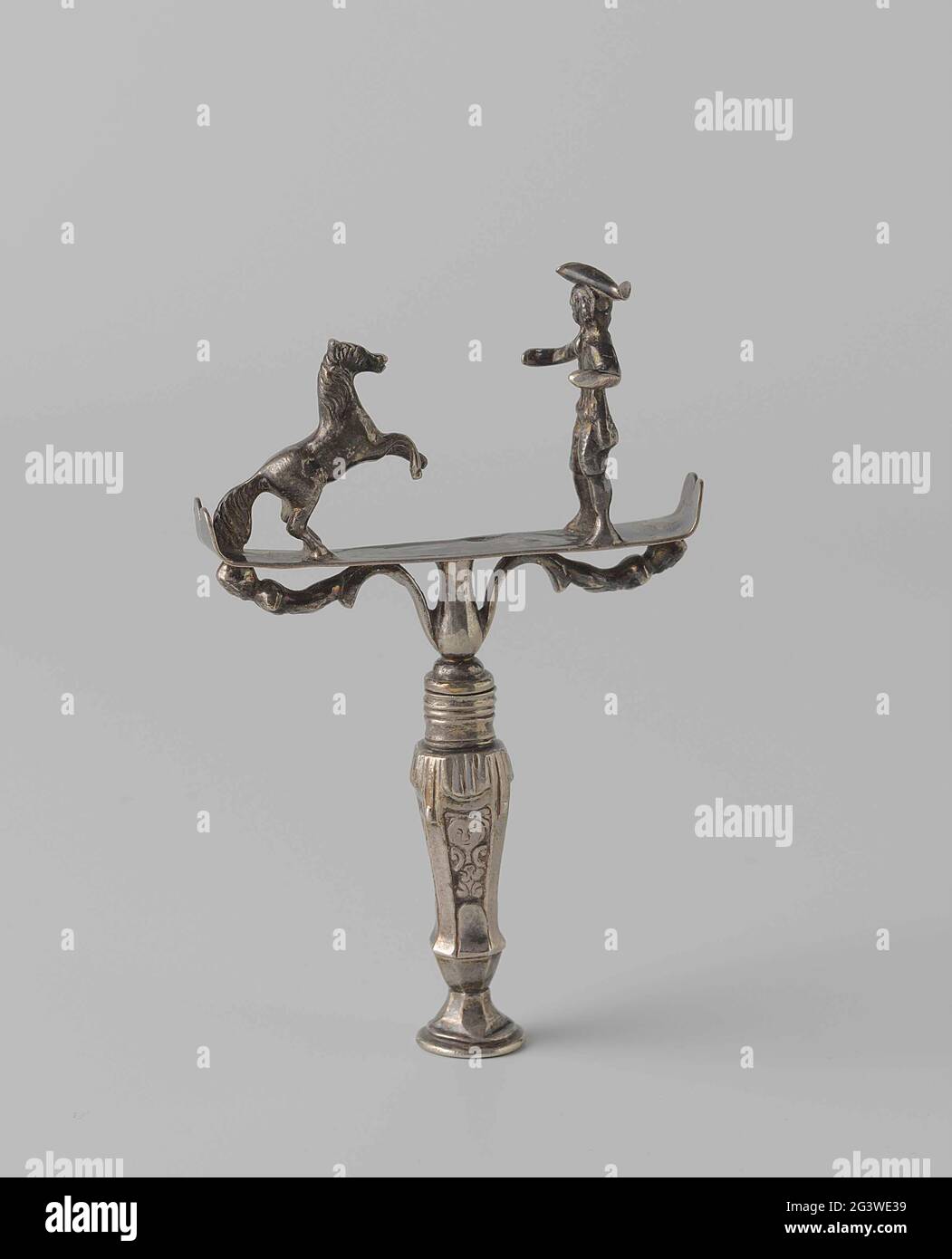 Corkscrew in sleeve, with cachet, on handle man and horse. Corkscrew in ...