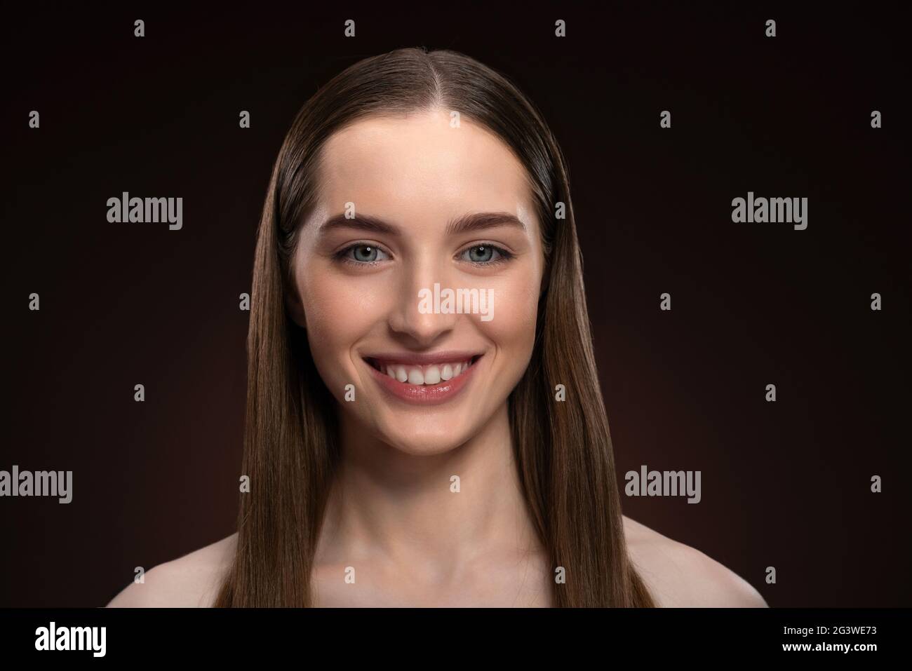Charming smiling girl face portrait with natural make up. Healthy pure ...